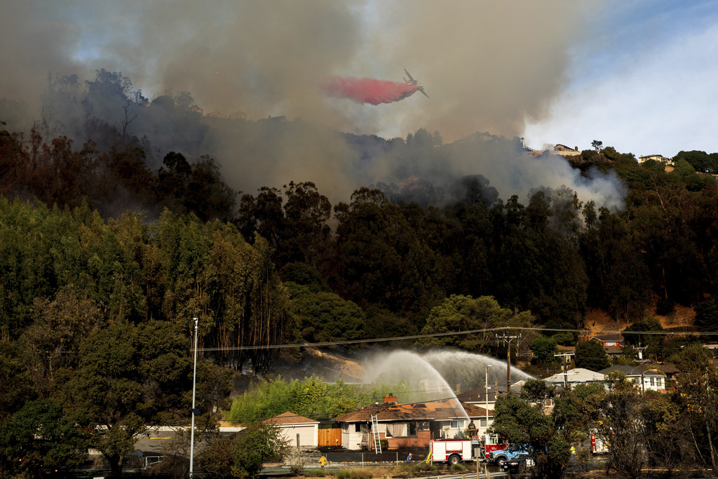 Fast-Moving, Wind-Driven Fire Forces Evacuations In Oakland, Cal ...